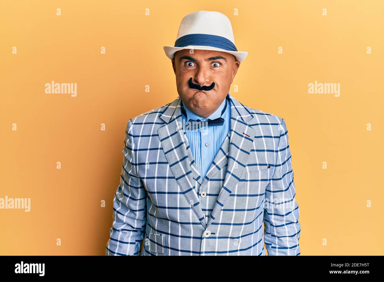 Mature middle east man with mustache wearing vintage and elegant ...