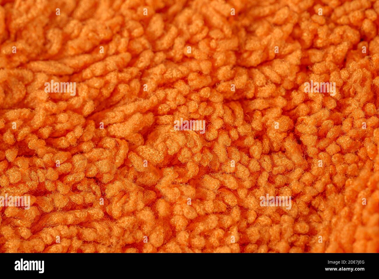 Orange Microfiber cloth surface texture background, special towel for ...