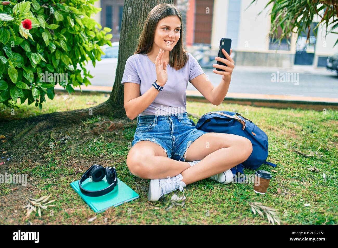 Young middle east student girl doing video call using smartphone at the ...