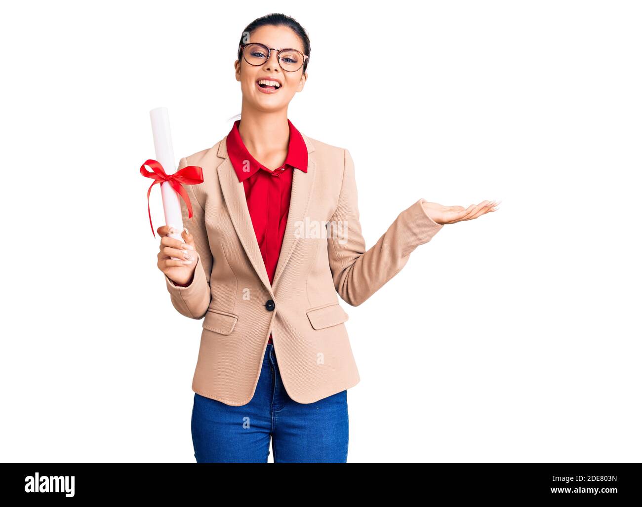 Young beautiful woman wearing glasses holding graduate degree diploma ...