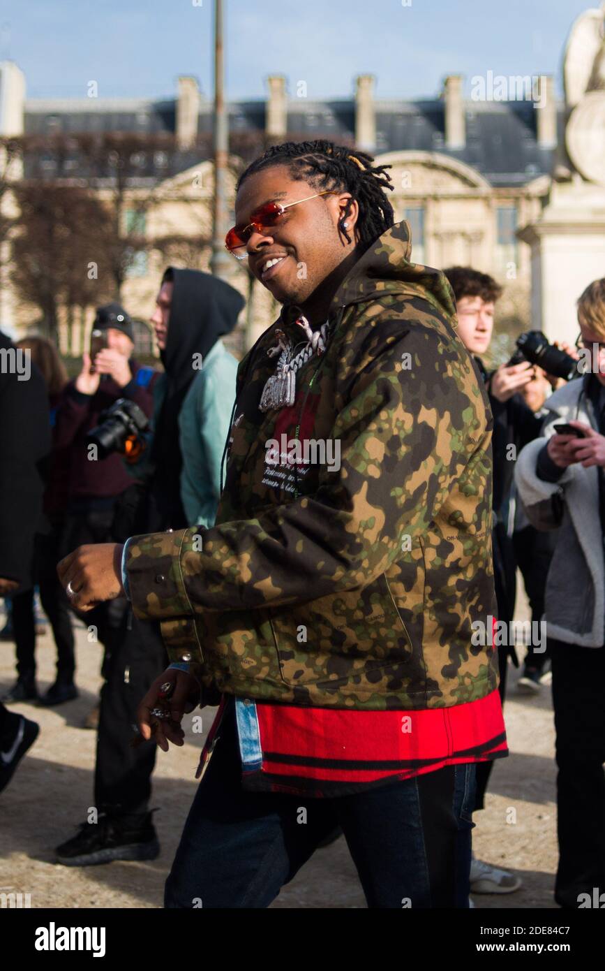 American rapper, Gunna, walks before the Off White shows as part of ...