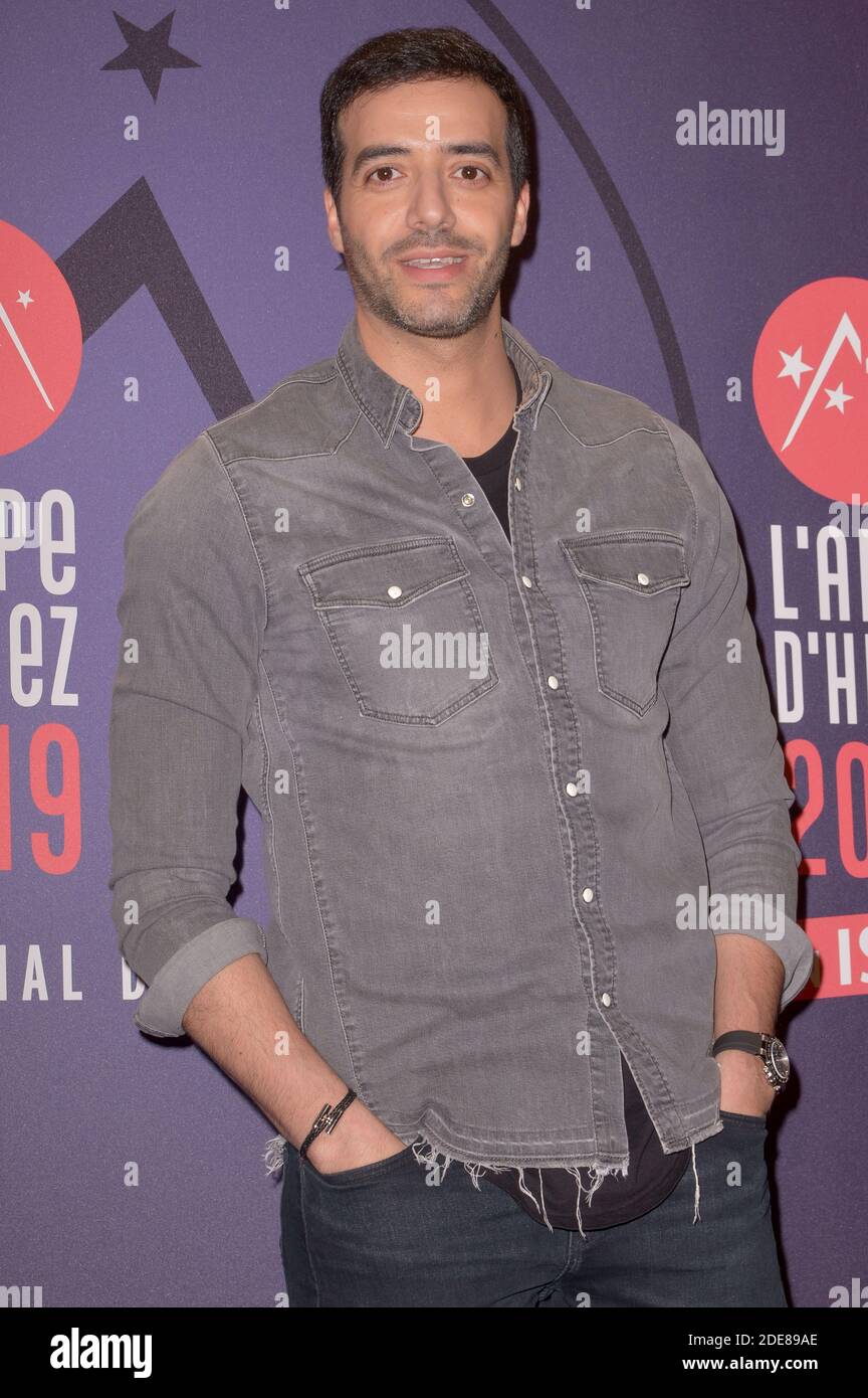 Tarek Boudali attending the screening of the movie Nicky Larson during ...
