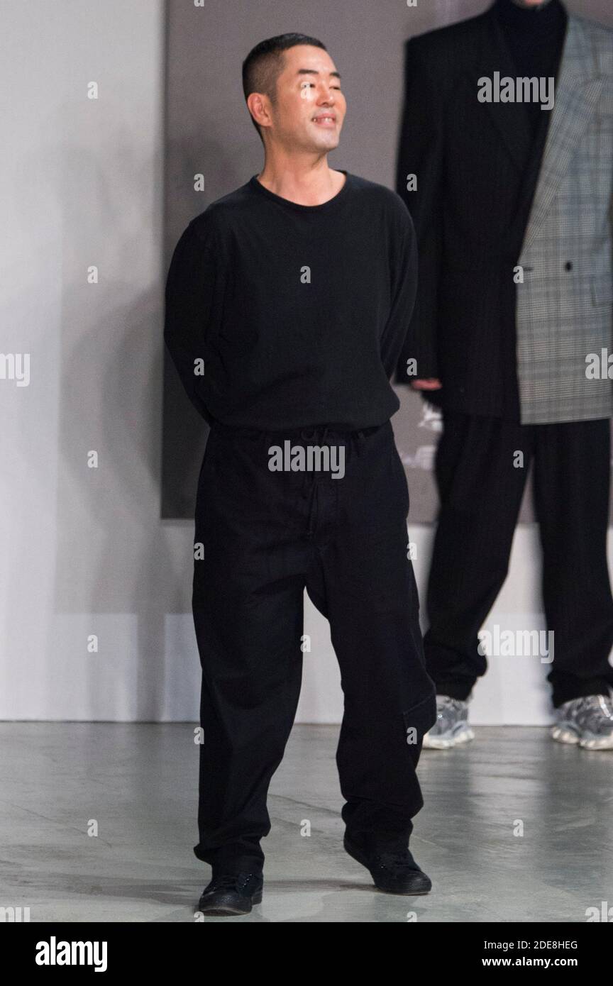Fashion designer Jung Wook Jun walks the runway during the Juun.J ...