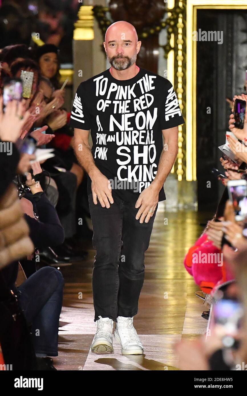 Fashion designer Bertrand Guyon walks the runway during the ...