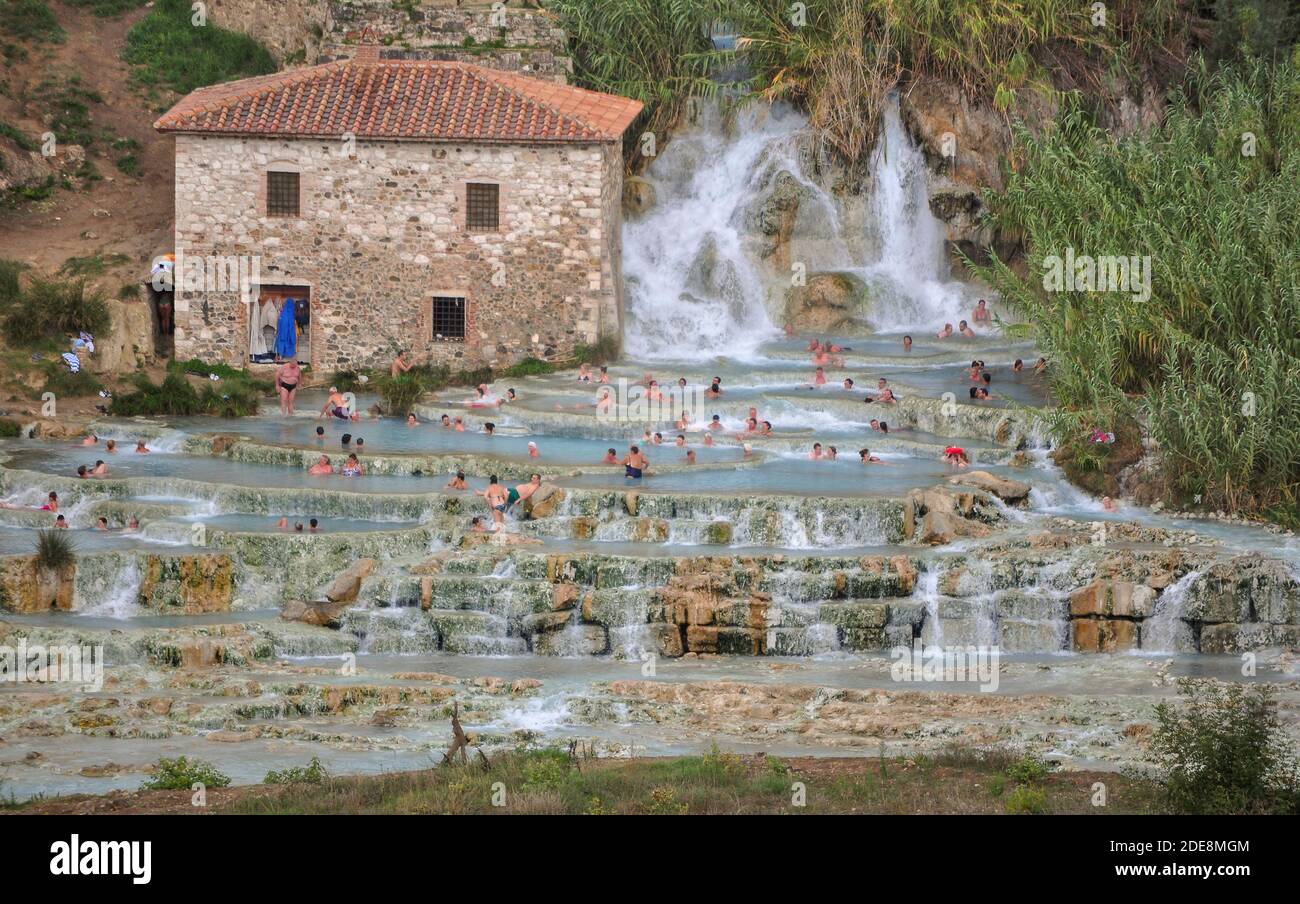 tourists bathing and relaxing at Saturnia hot springs, Toskany, Italy ...