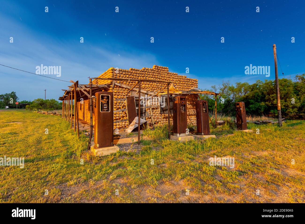 Antiques gas pumps at a filling station made out of rocks Stock Photo ...
