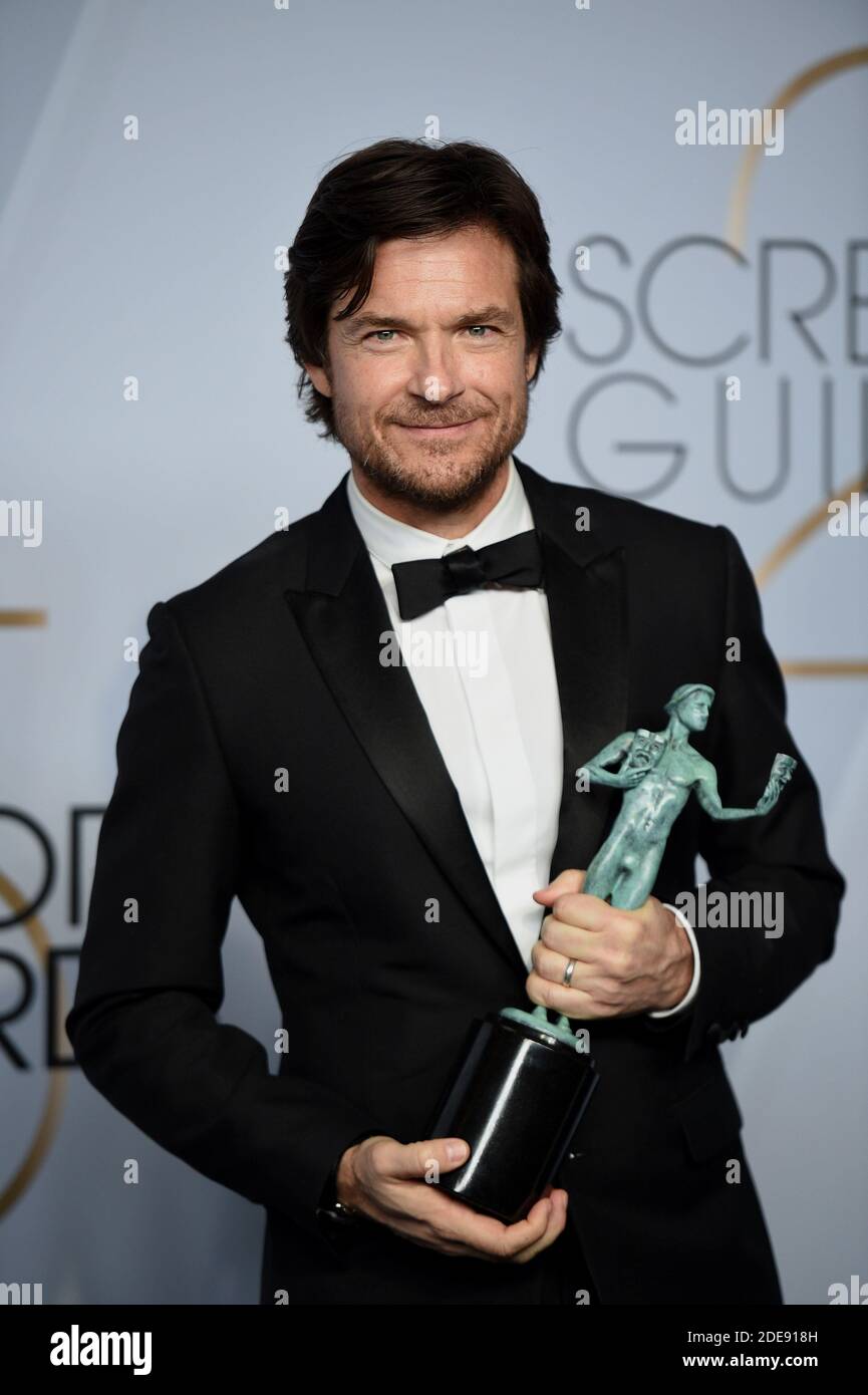 Jason Bateman poses in the press room during the 25th Annual Screen ...