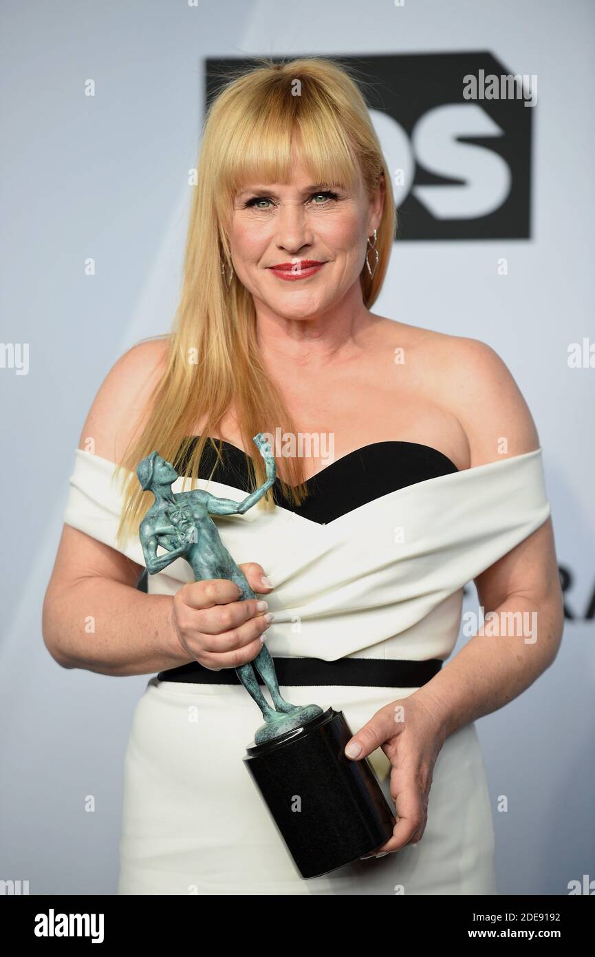Patricia Arquette poses in the press room during the 25th Annual Screen ...
