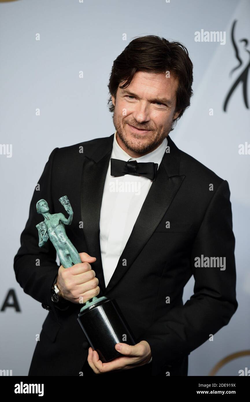 Jason Bateman poses in the press room during the 25th Annual Screen ...