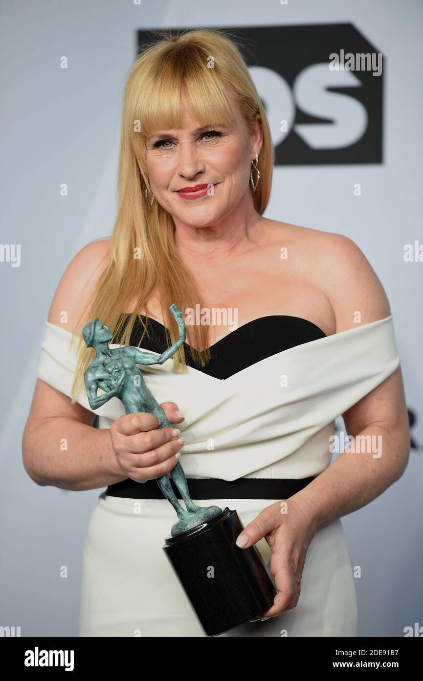 Patricia Arquette poses in the press room during the 25th Annual Screen ...