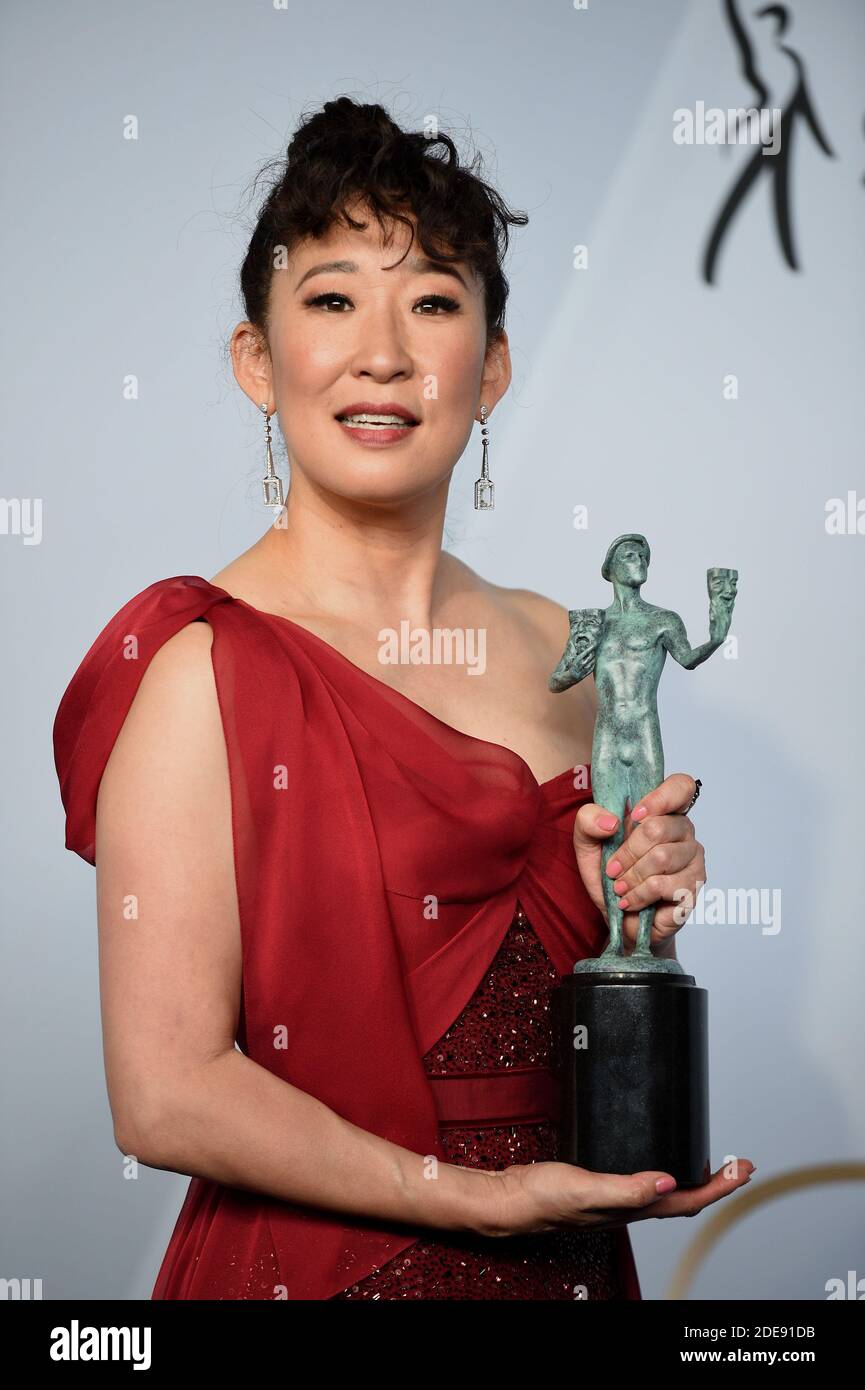 Sandra Oh poses in the press room during the 25th Annual Screen Actors ...