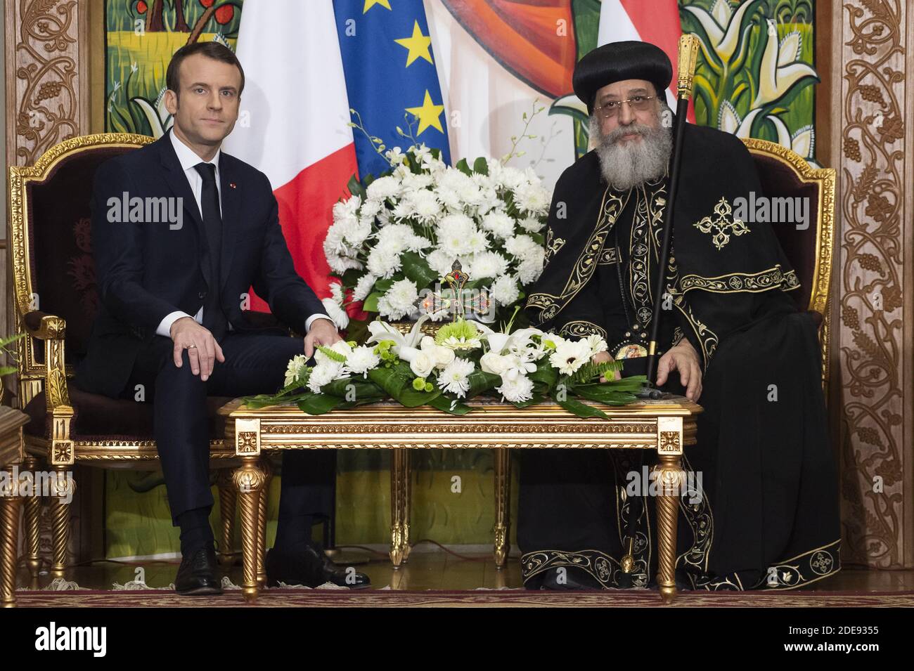 French President Emmanuel Macron speaks with His Holiness Tawadros II ...