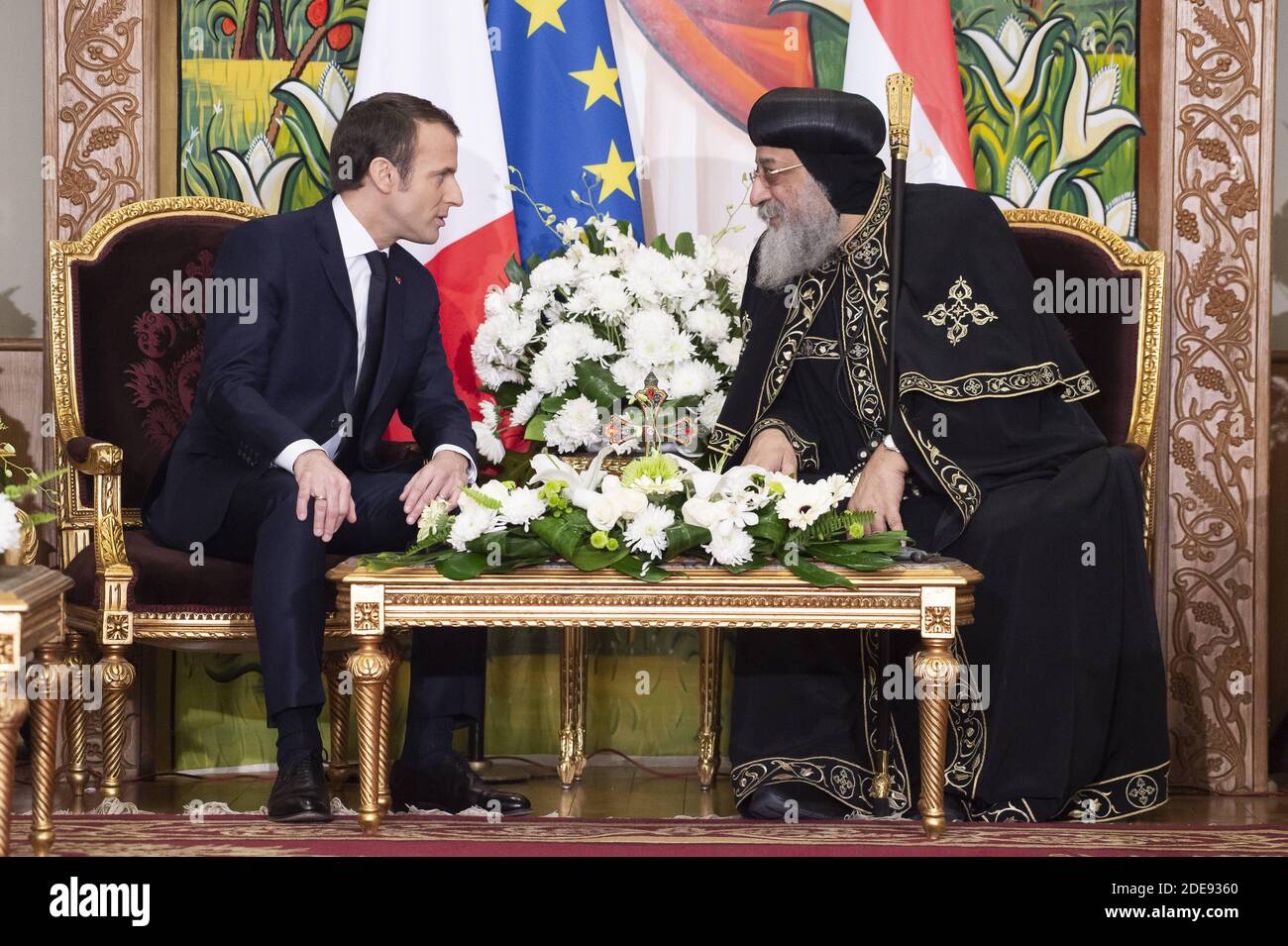 French President Emmanuel Macron speaks with His Holiness Tawadros II ...