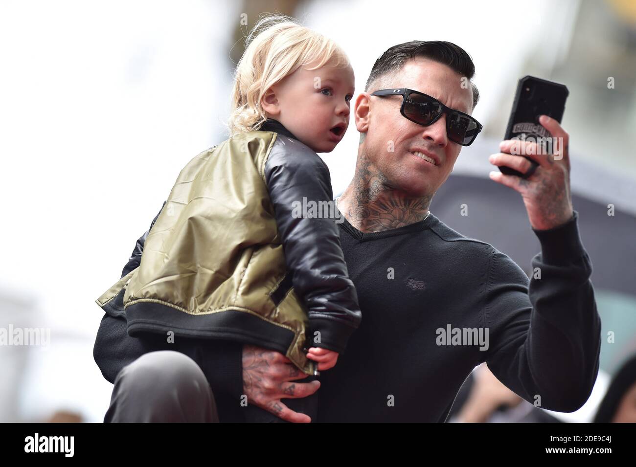 Carey Hart and Jameson Moon Hart attend the ceremony honoring Pink with ...