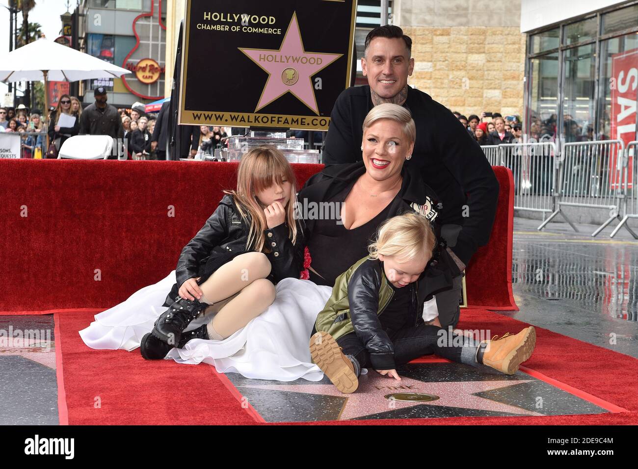 Carey Hart, Willow Sage Hart and Jameson Moon Hart attend the ceremony ...