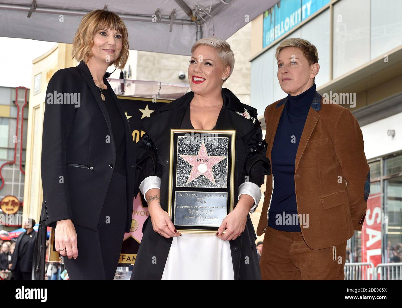 Kerri Kenney-Silver and Ellen Degeneres attend the ceremony honoring ...