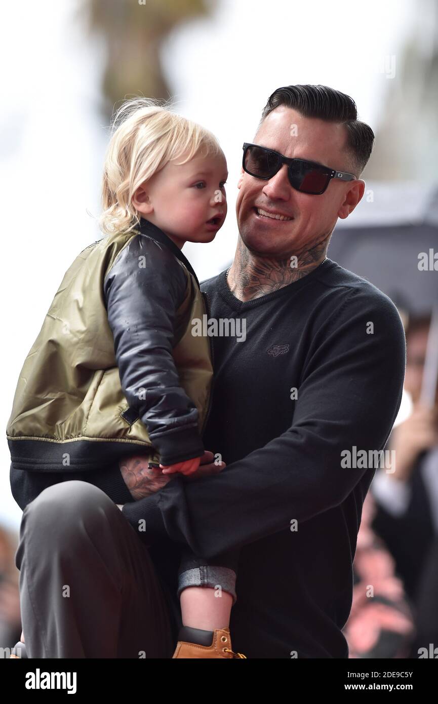 Carey Hart and Jameson Moon Hart attend the ceremony honoring Pink with ...