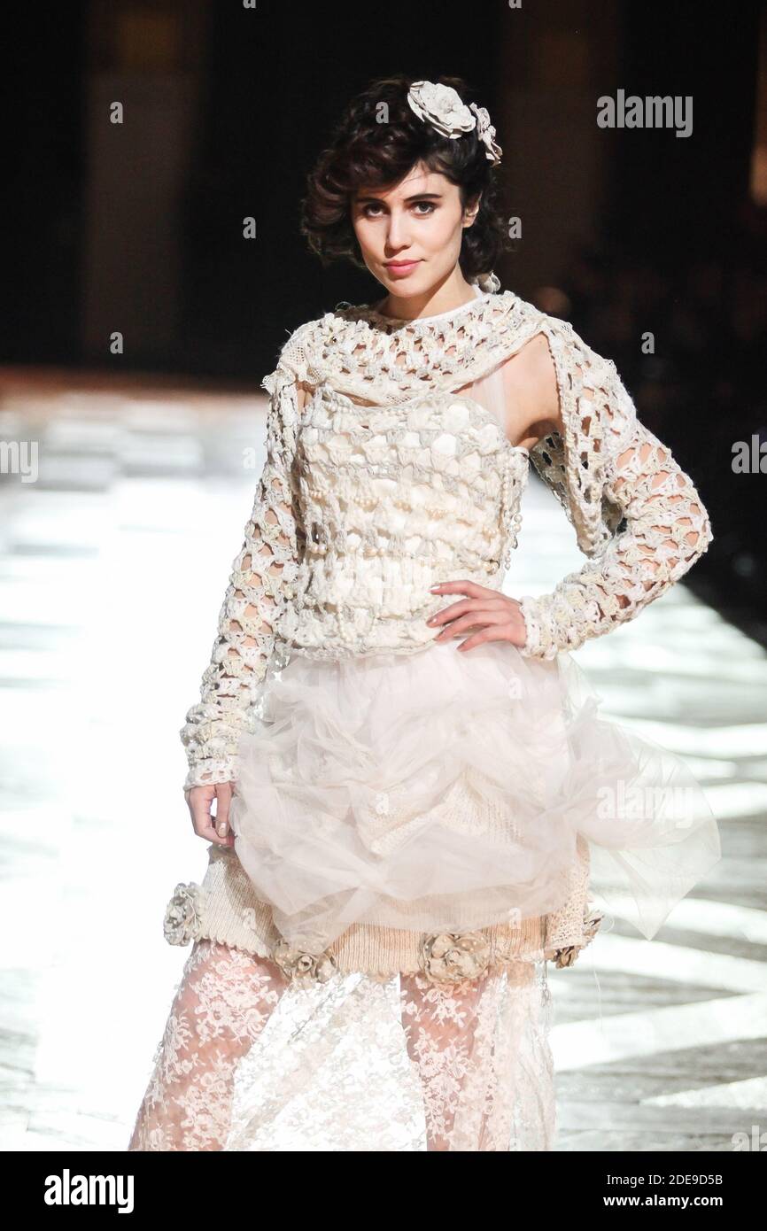 A model walks the runway for Solidarity Fashion Show (Defile Solidaire ...