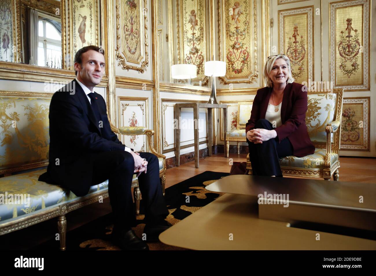 French President Emmanuel Macron (L) attends a meeting with French far ...