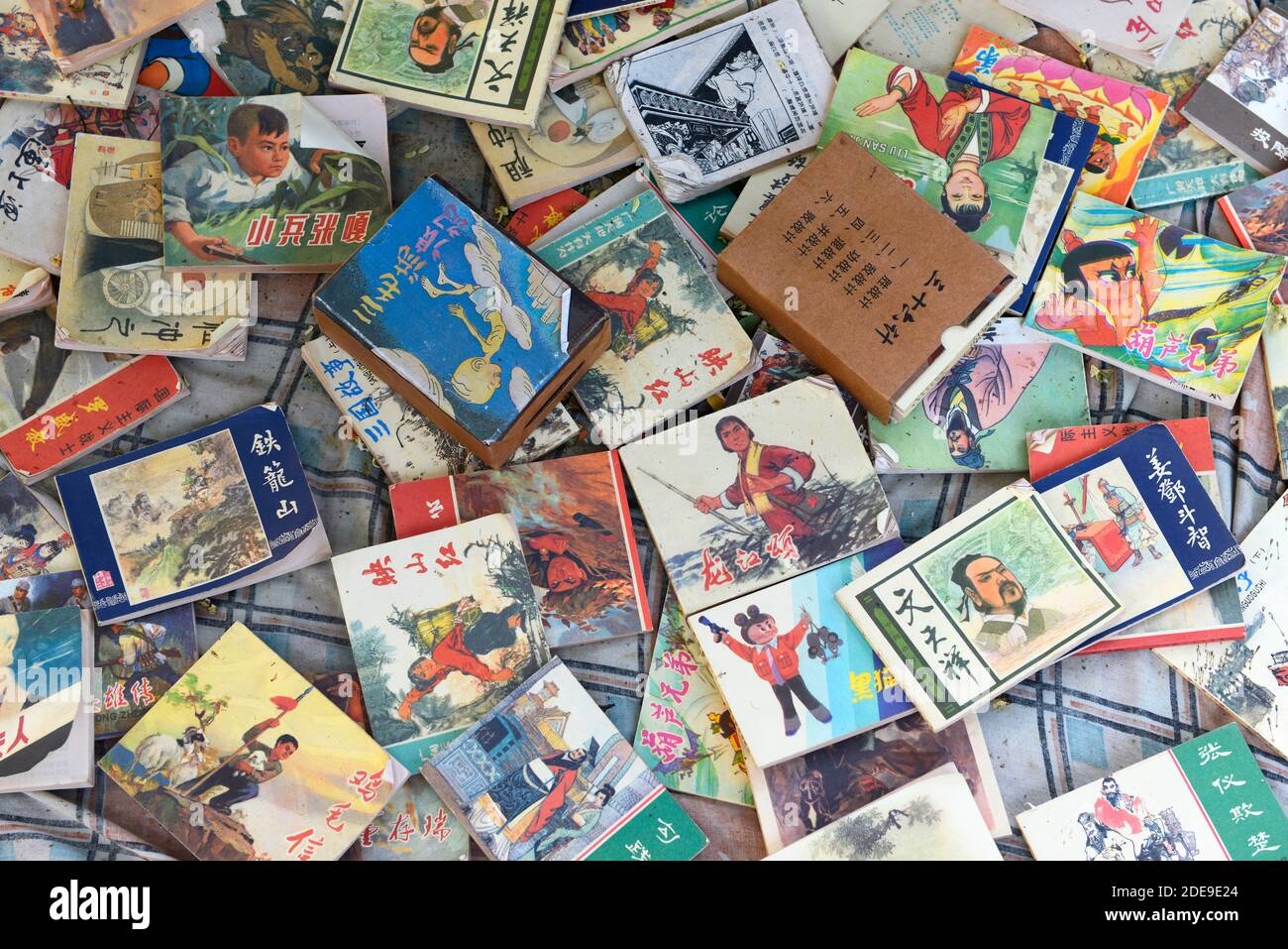 A range of old picture books for sale at a street market in western ...