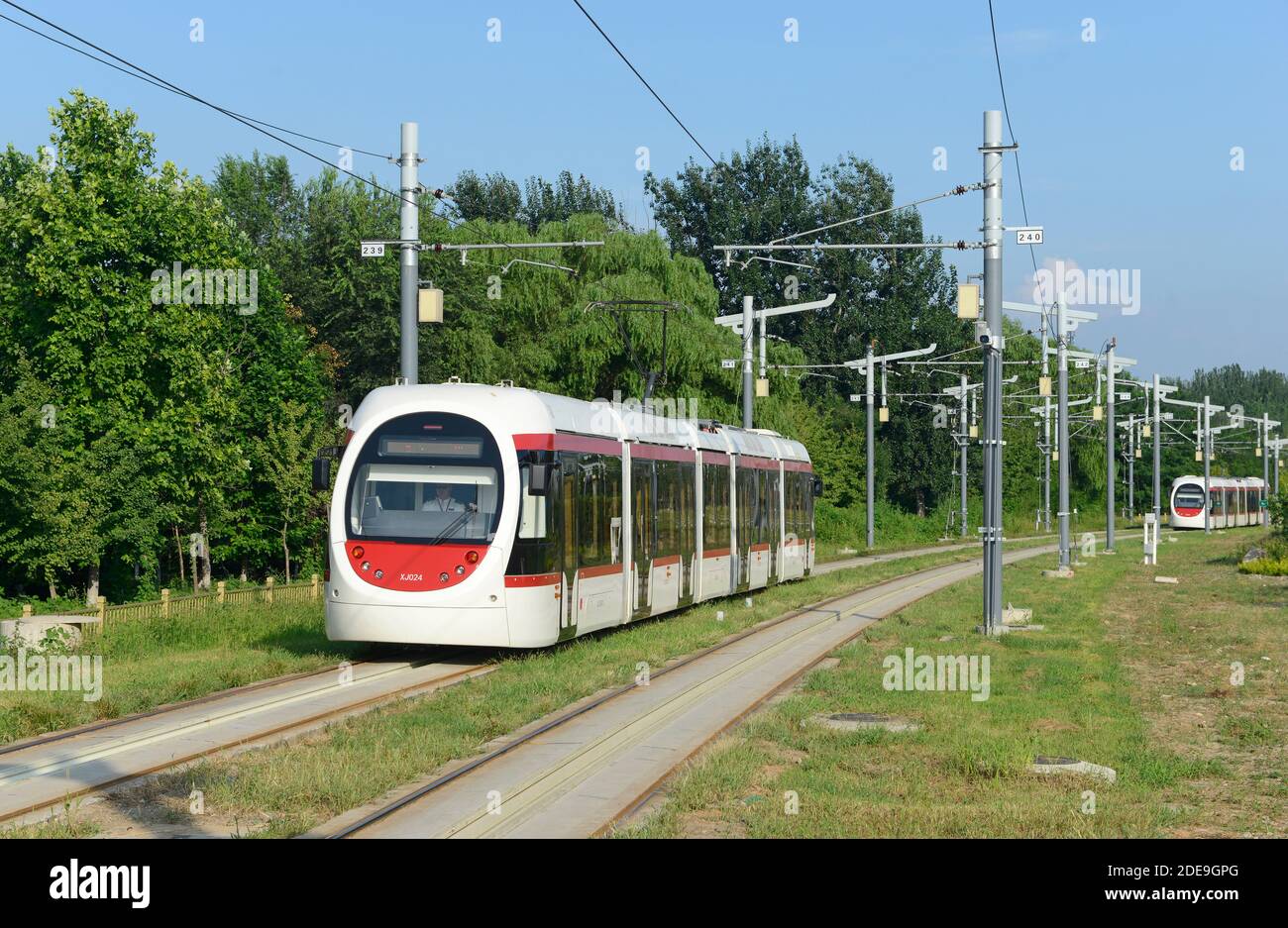 A tram approaches Yiheyuanximen station serving the western gate of the ...
