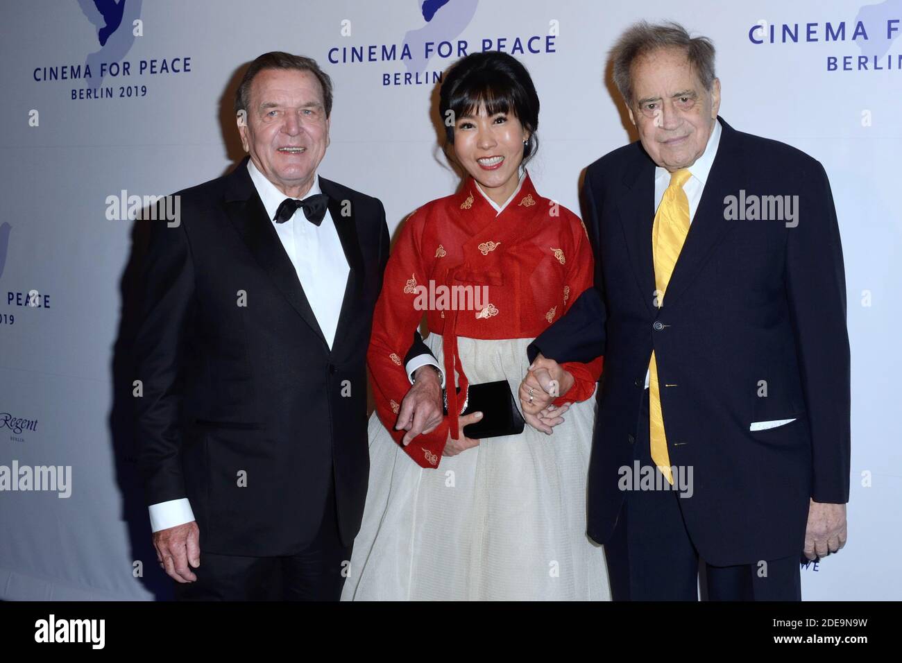 Former German Chancellor Gerhard Schroder, his South Korean wife Soyeon ...