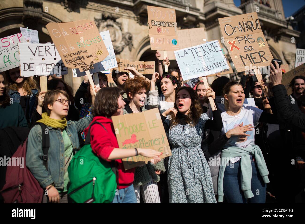 Students shout slogans during the march for the environment and the ...
