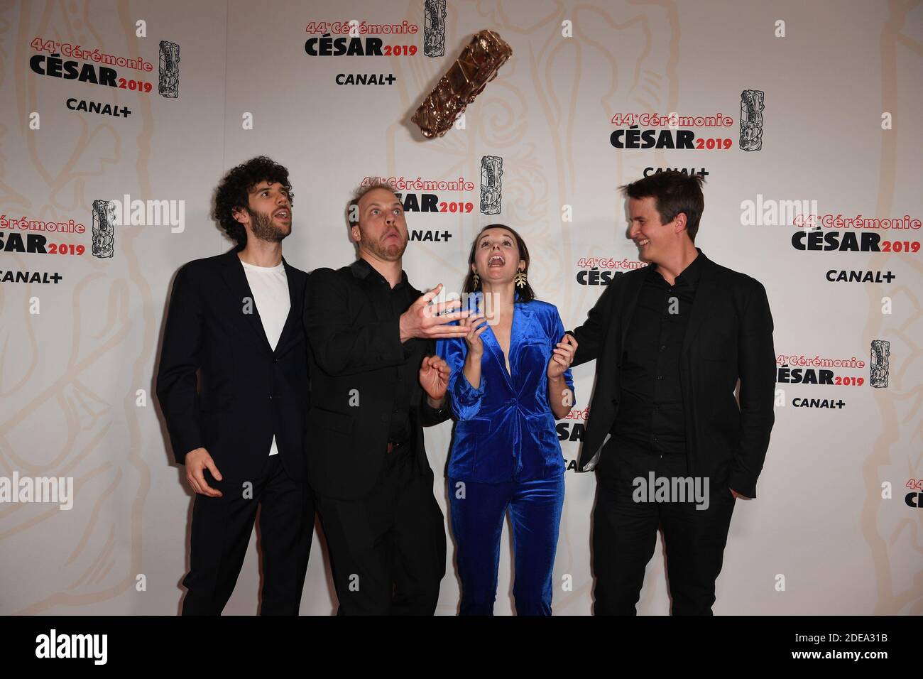 French director Remi Allier (2L) and the 'Les Petites Mains' (Little ...