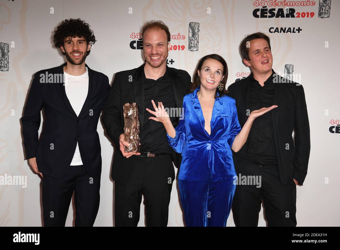 French director Remi Allier (2L) and the 'Les Petites Mains' (Little ...