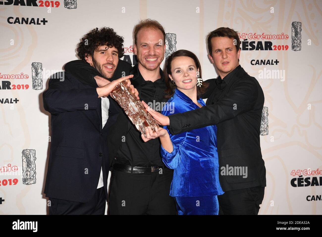 French director Remi Allier (2L) and the 'Les Petites Mains' (Little ...