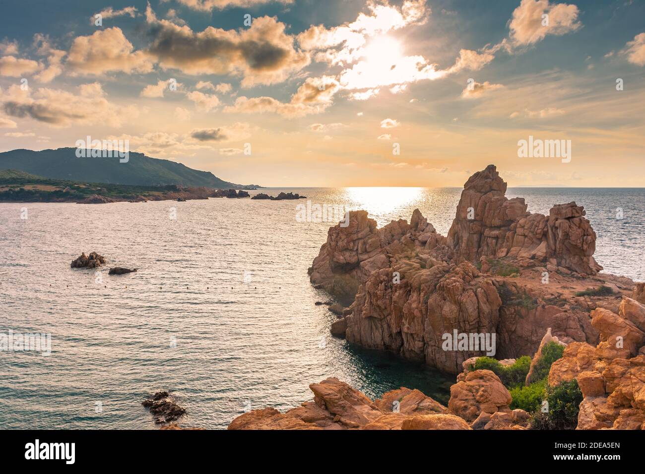 Sunset over Li Cossi beach, Sardinia, Italy Stock Photo - Alamy