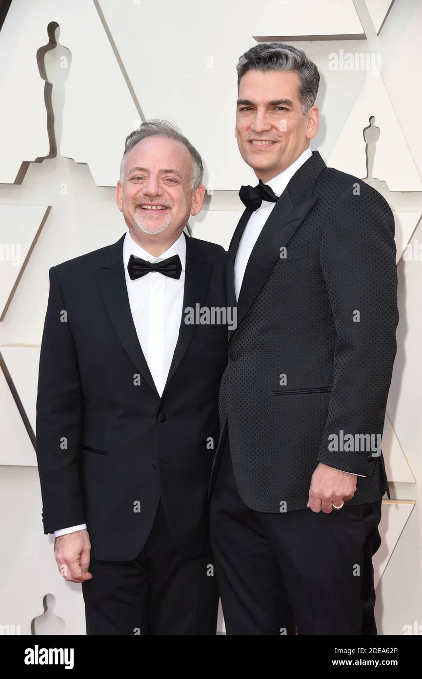 Composer Marc Shaiman and Louis Mirabal walking the red carpet as ...