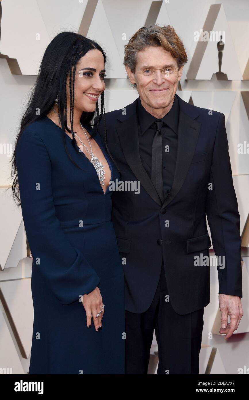 Willem Dafoe and wife Giada Colagrande walking the red carpet as ...