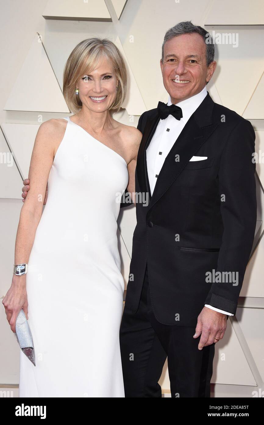Willow Bay (L) and Robert Iger (R) walking the red carpet as arriving ...