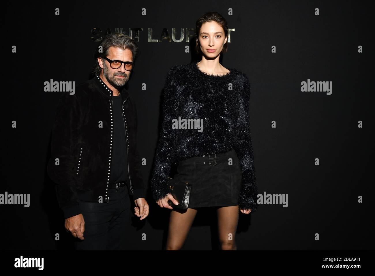 Chris Colis and Alexandra Agoston attend the Saint Laurent show as part ...