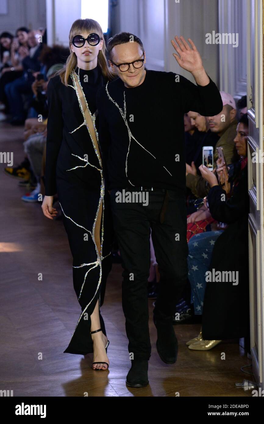 Designer Richard Rene makes an appearance on the runway during the Guy ...