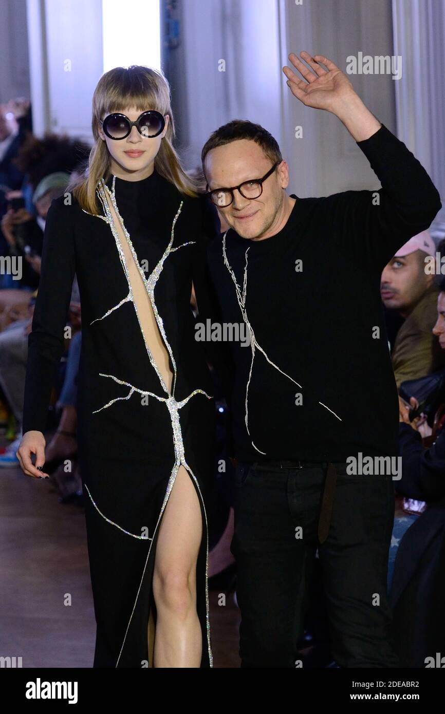 Designer Richard Rene makes an appearance on the runway during the Guy ...