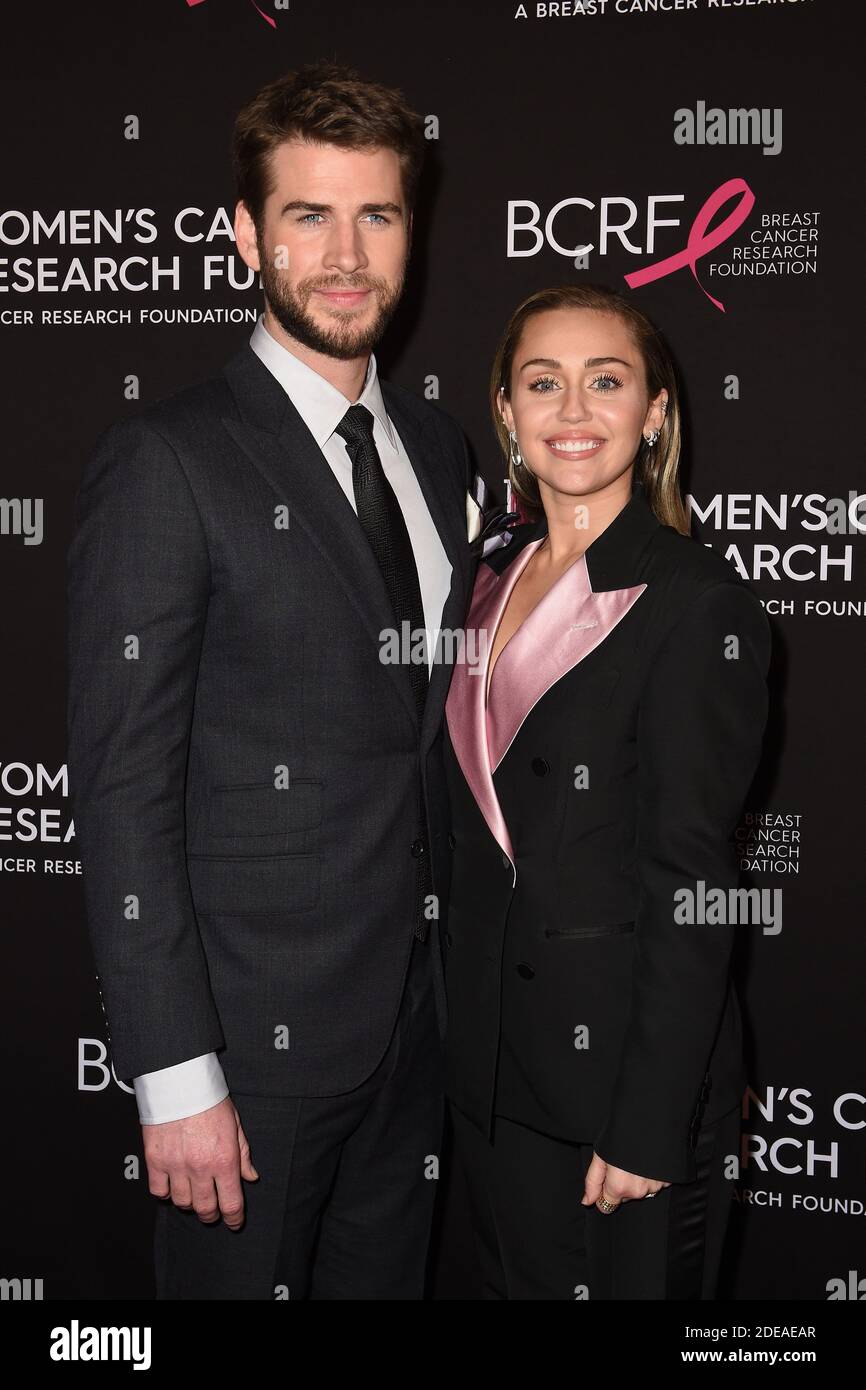 Liam Hemsworth and Miley Cyrus attend the Women's Cancer Research Fund ...