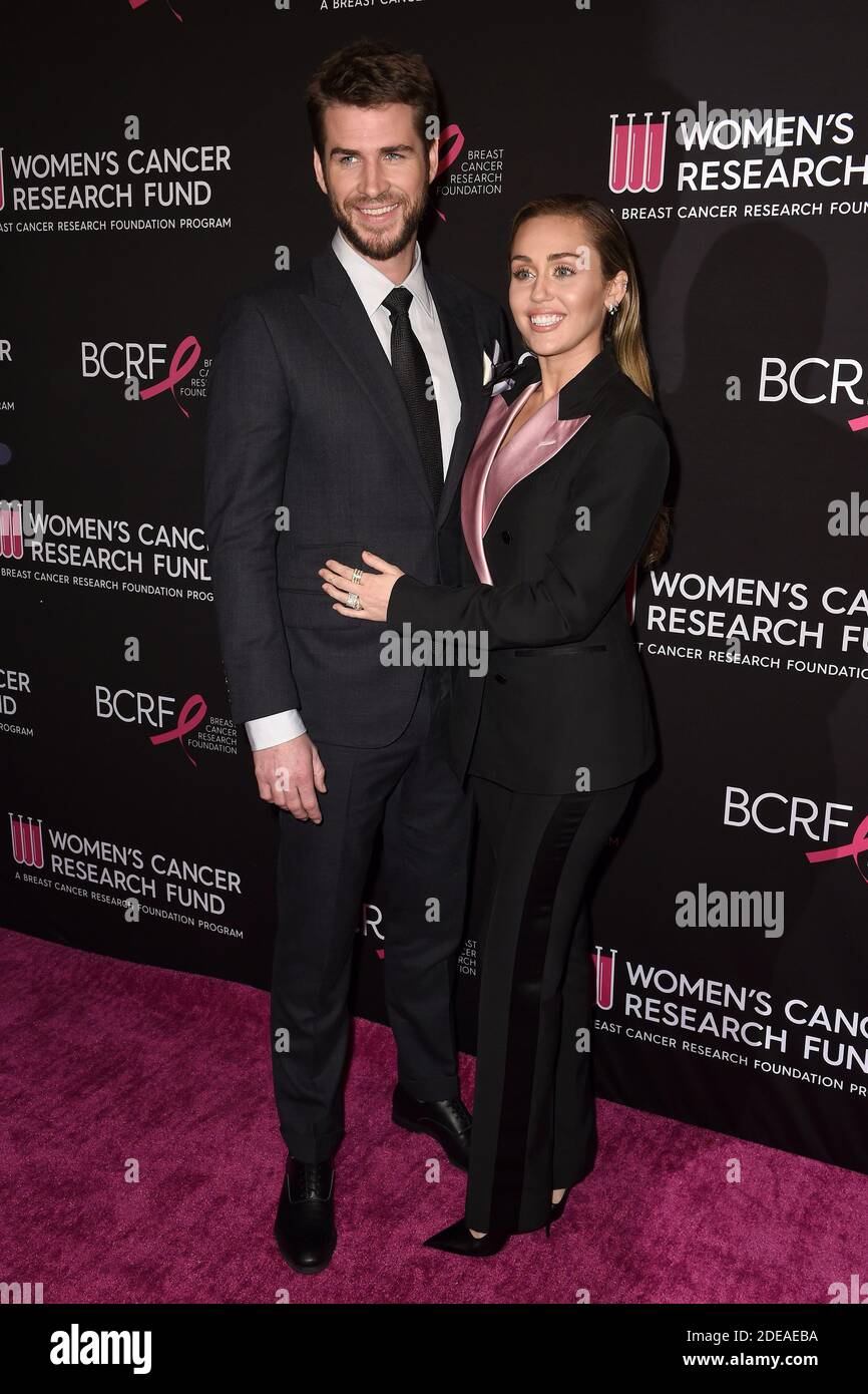 Liam Hemsworth and Miley Cyrus attend the Women's Cancer Research Fund ...