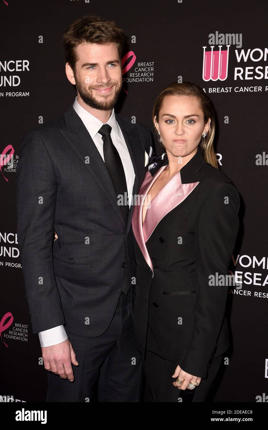 Liam Hemsworth and Miley Cyrus attend the Women's Cancer Research Fund ...