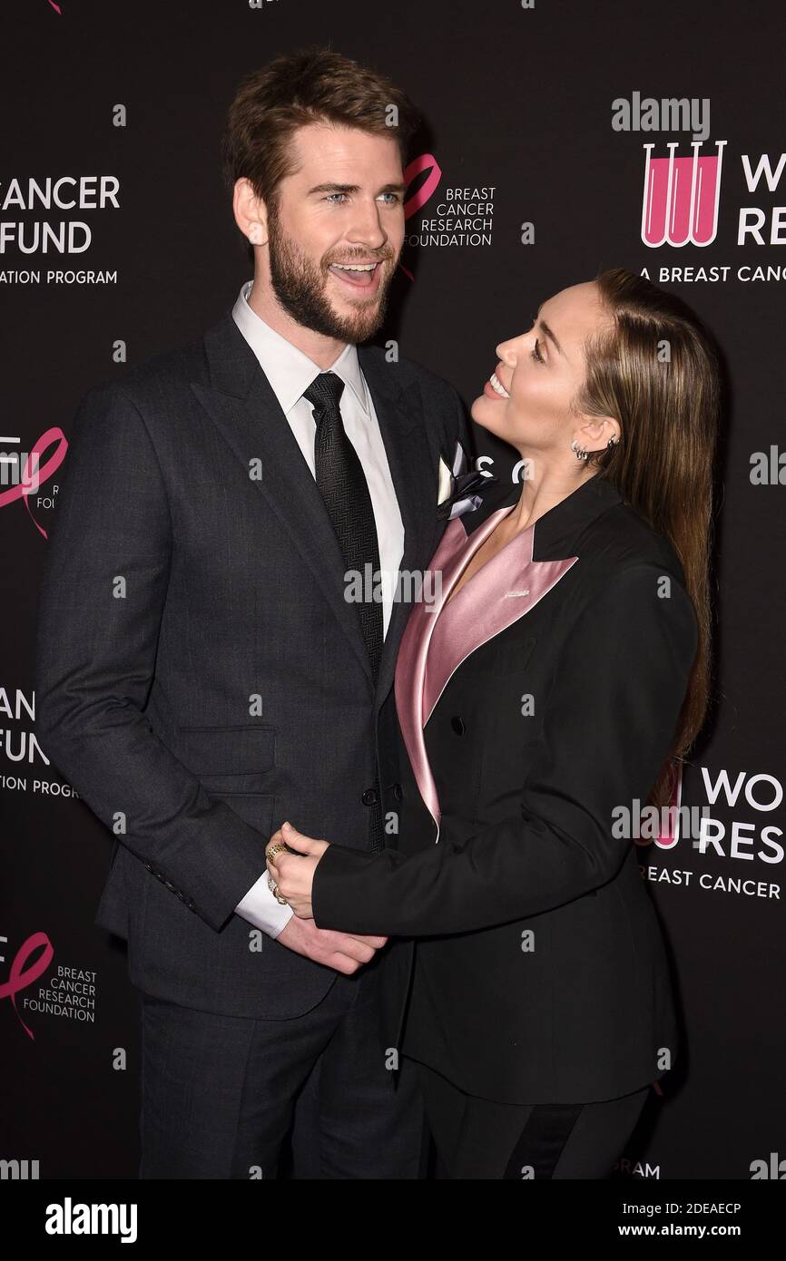 Liam Hemsworth and Miley Cyrus attend the Women's Cancer Research Fund ...