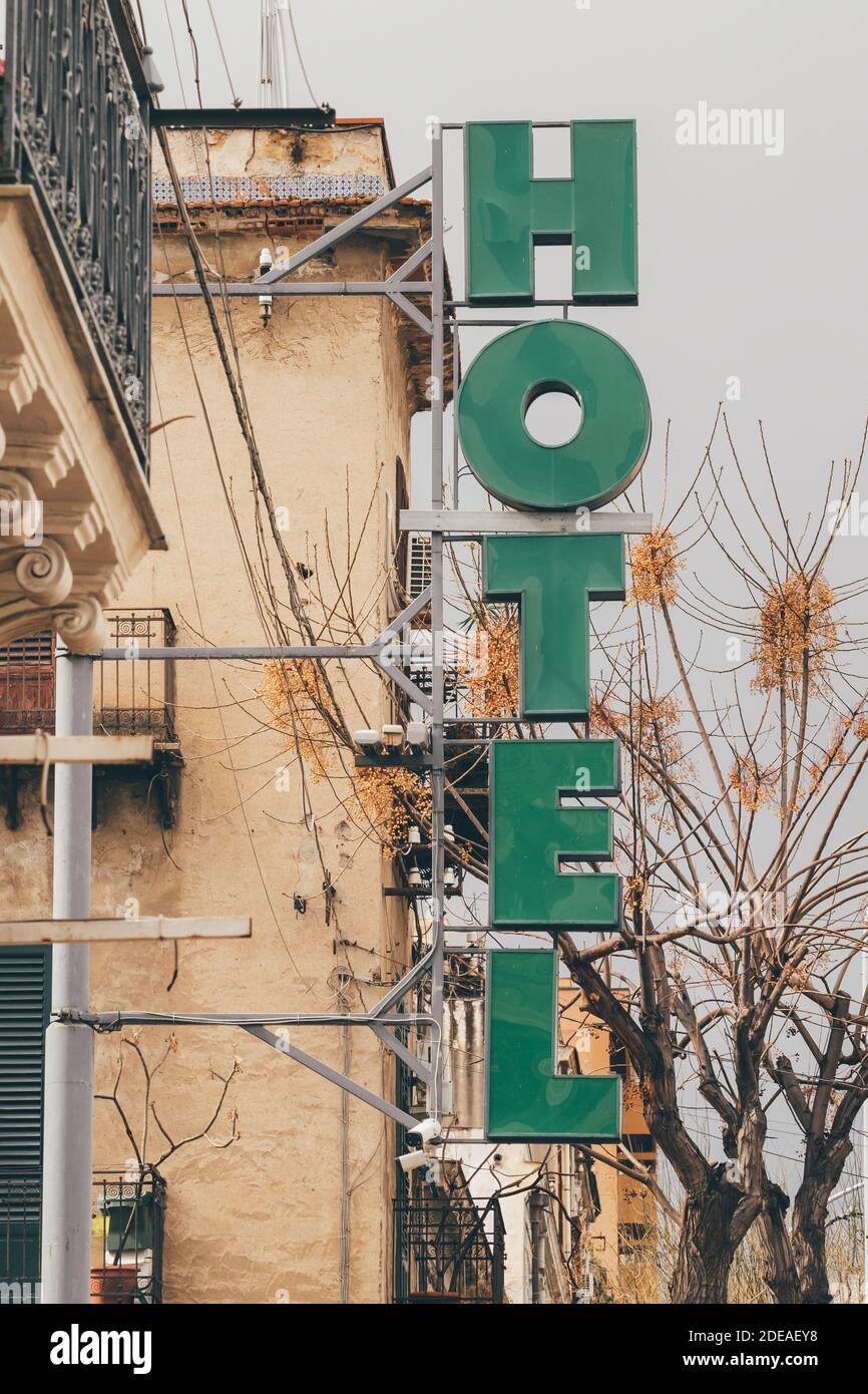 Retro hotel sign on the building corner Stock Photo - Alamy