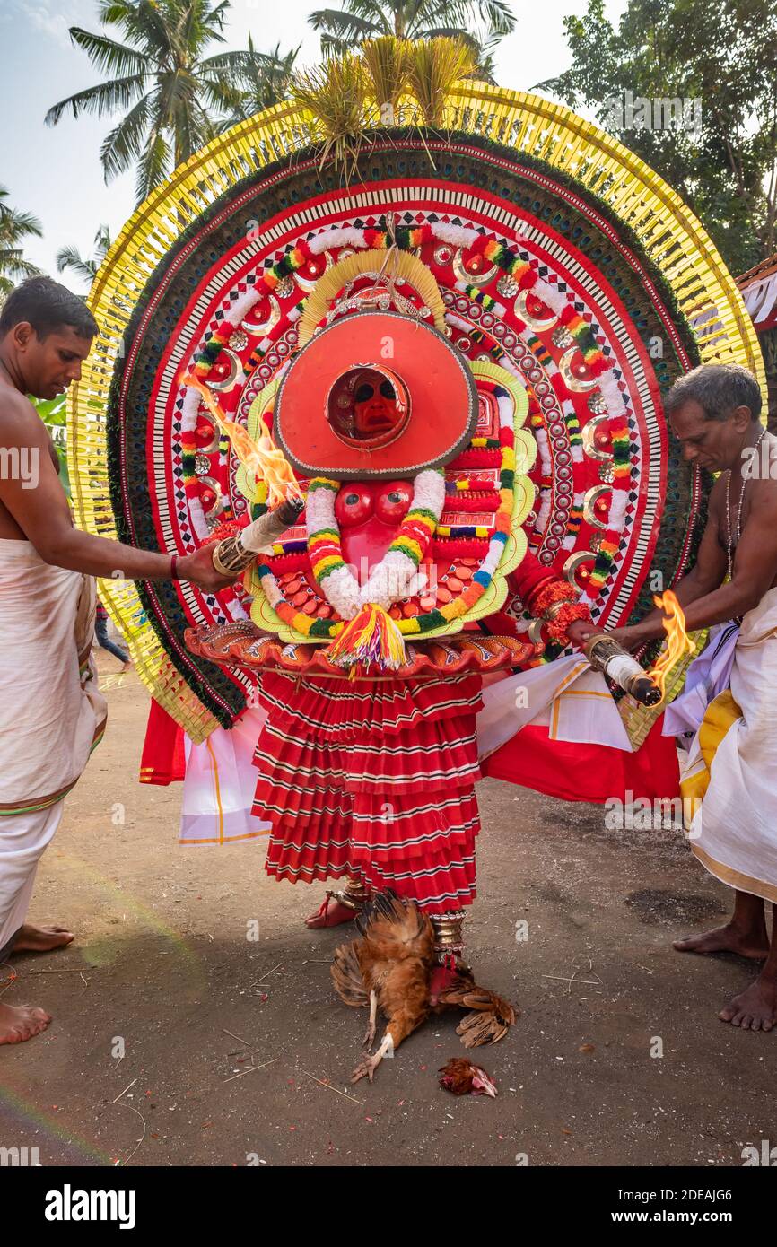 Theyyam artist perform during temple festival in Payyanur, Kerala ...