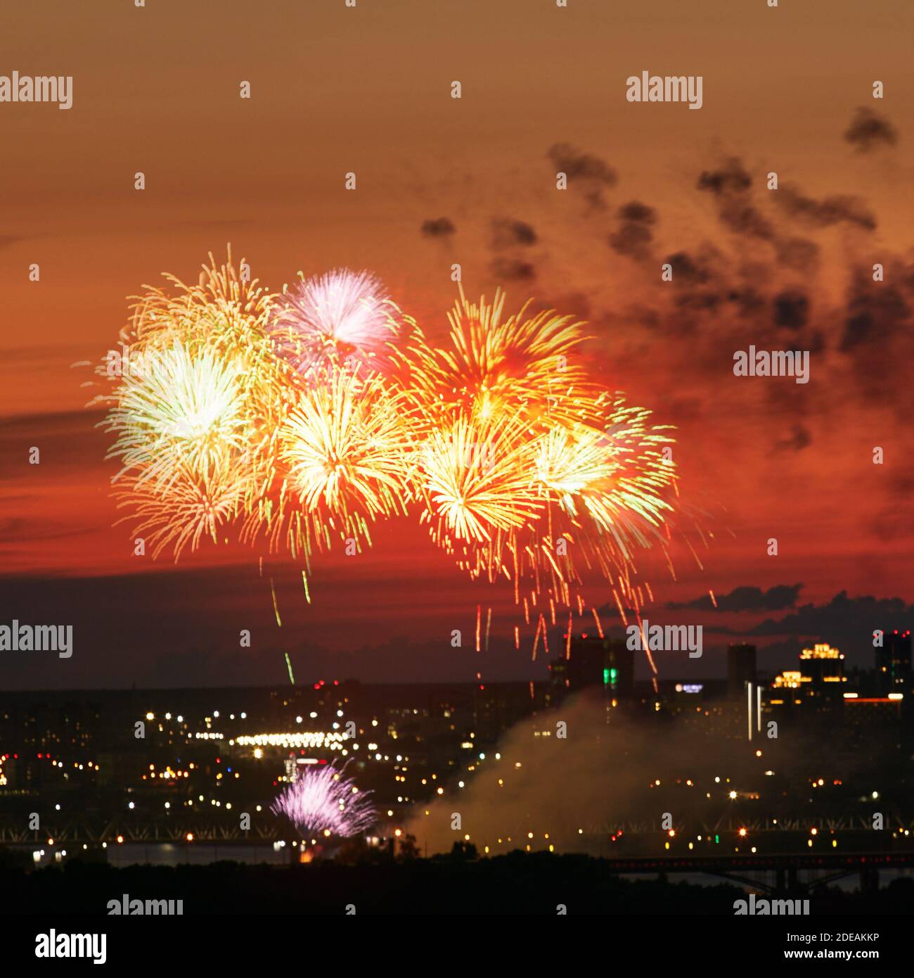Fantastic fireworks over night city Stock Photo - Alamy