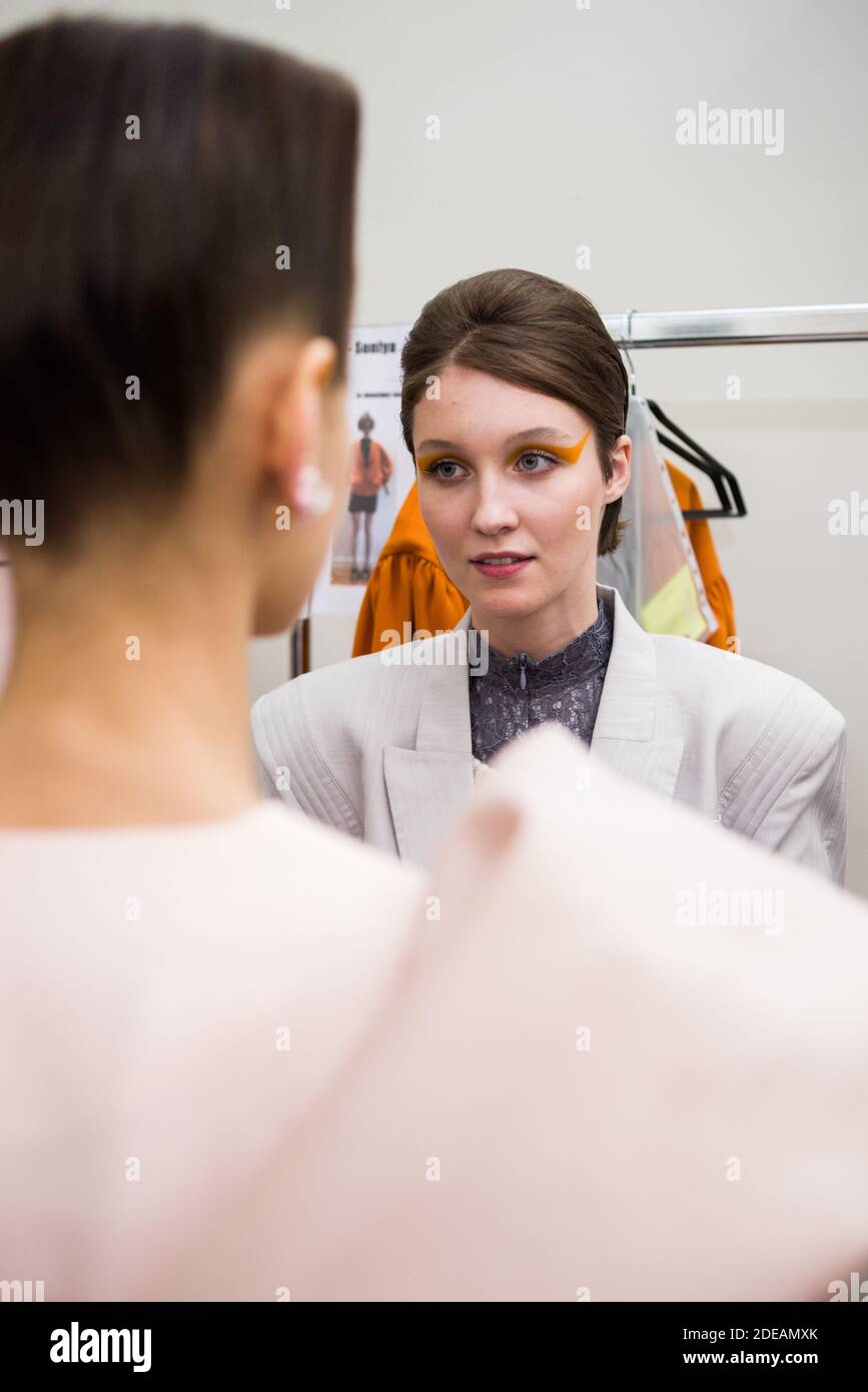 Models get prepared before the Liu Chao show as part of Paris Fashion ...