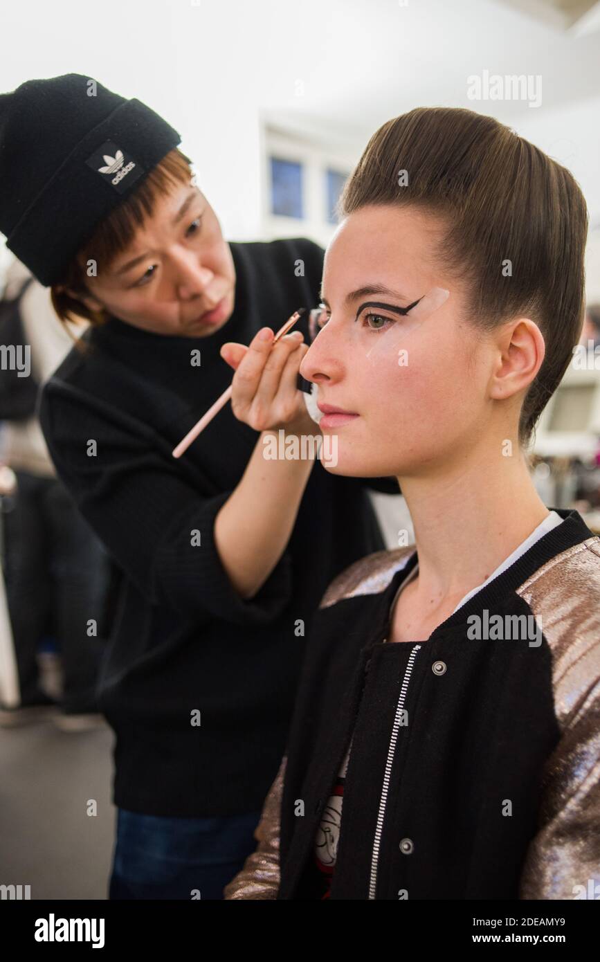 Models get prepared before the Liu Chao show as part of Paris Fashion ...