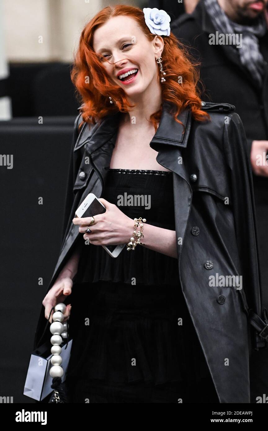 Karen Elson poses before the Chanel show as part of Paris Fashion Week ...