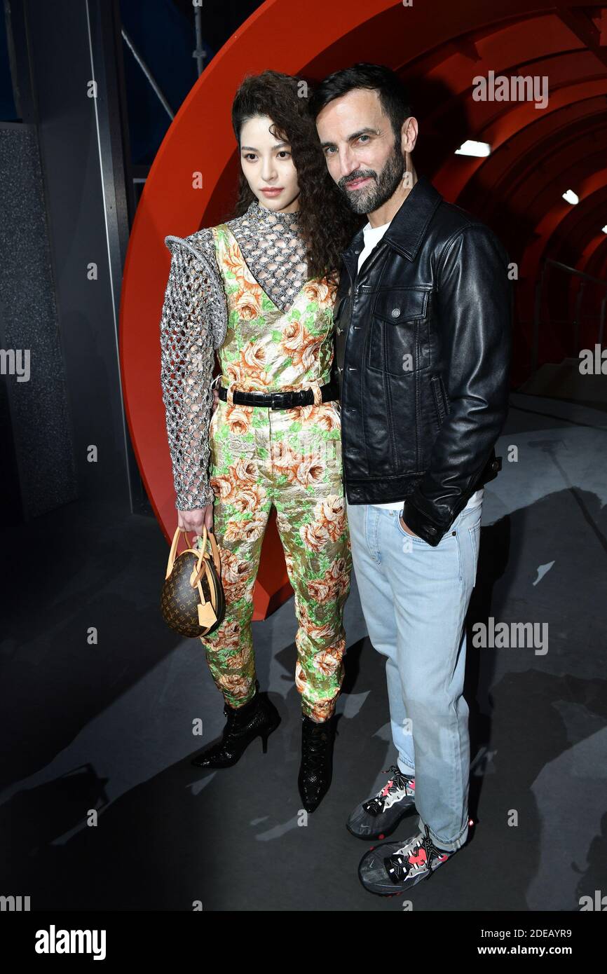 Zhong Chuxi and Stylist Nicolas Ghesquiere pose after the Louis Vuitton ...