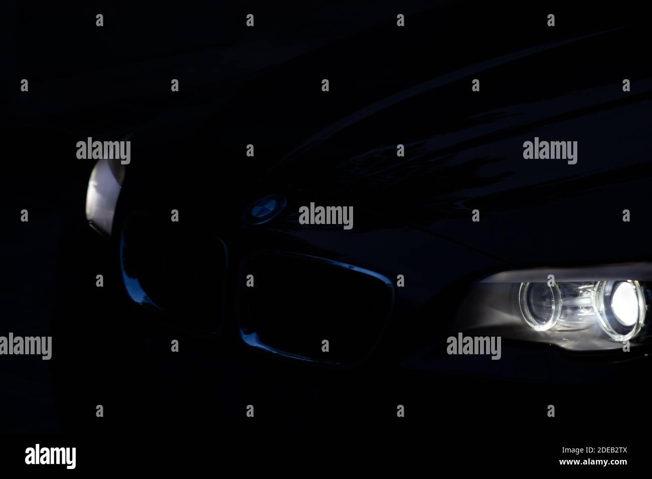 Luxury Car headlights beam driving fast dark night Stock Photo - Alamy