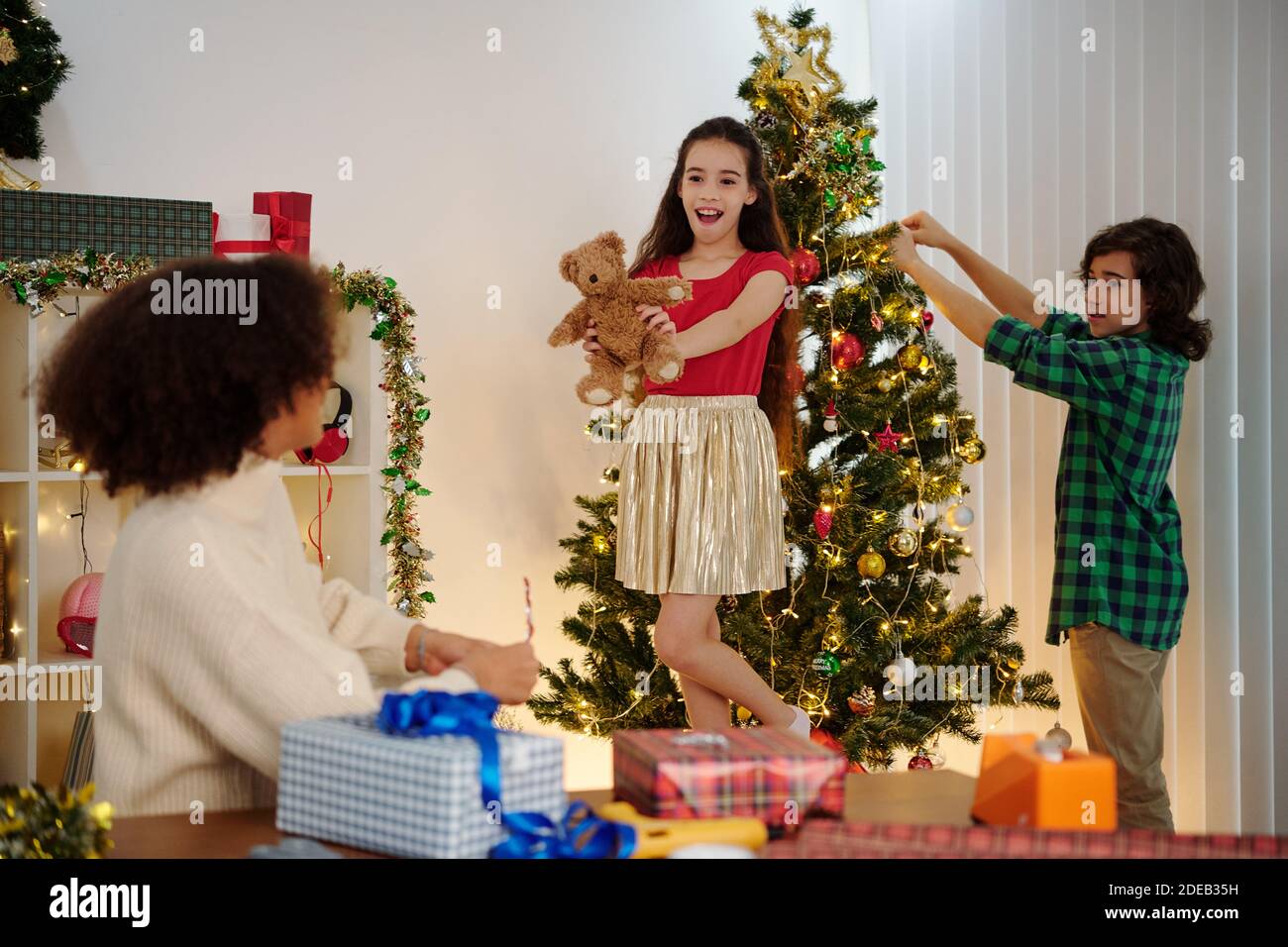 Girl showing her present Stock Photo - Alamy